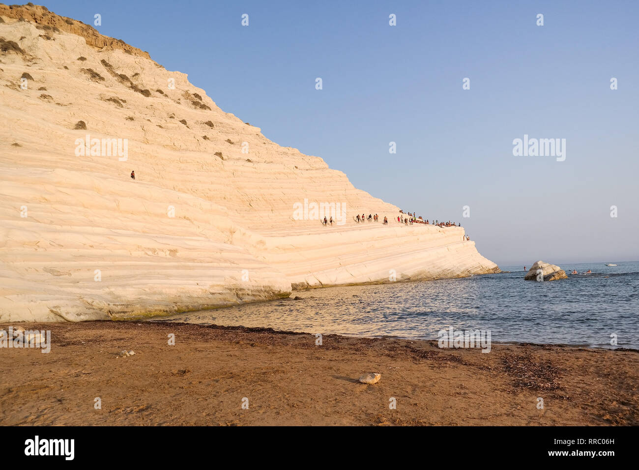 Unusual white sea cliff Scala dei Turchi with steps up the jagged ...