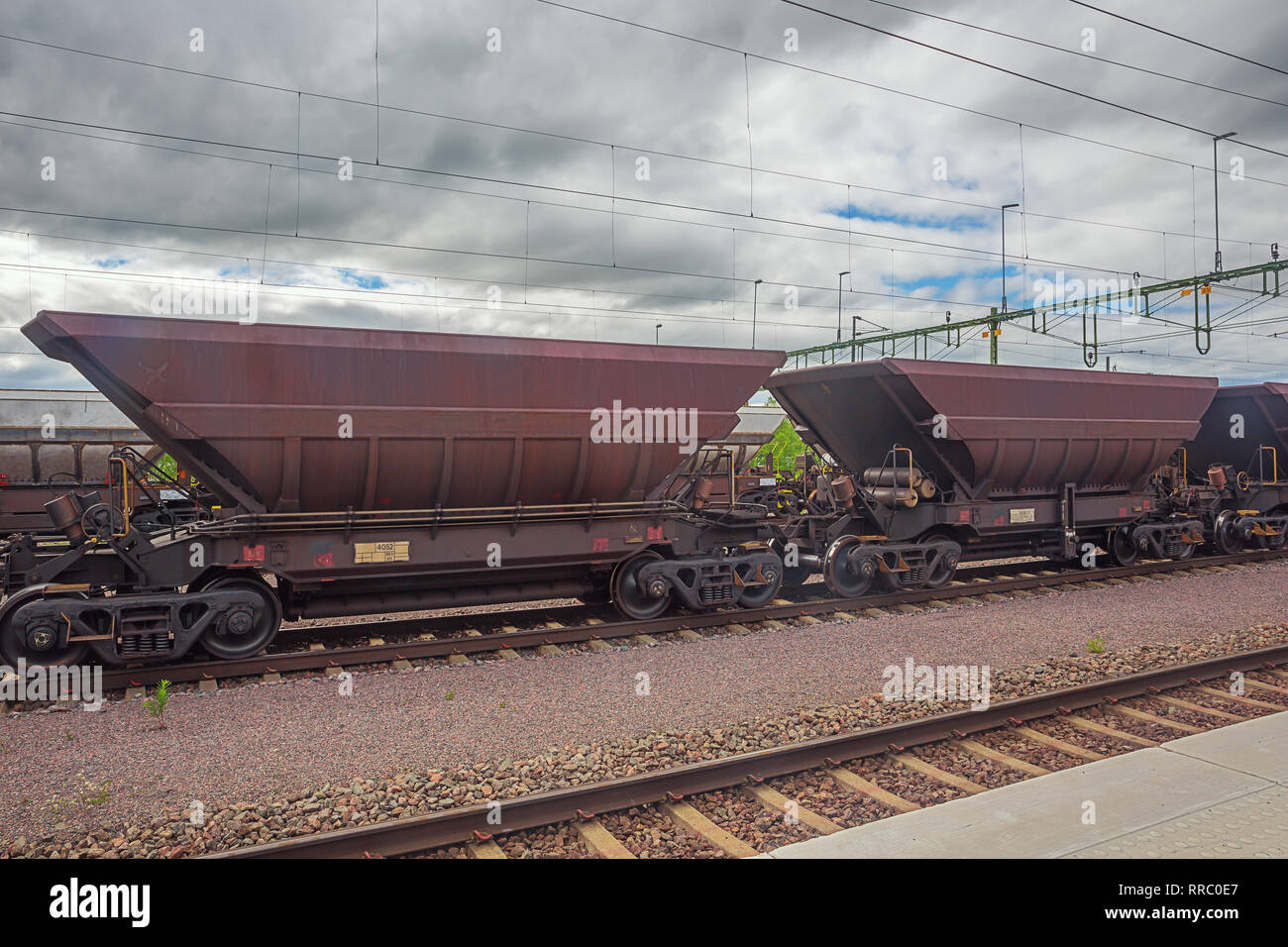 Editorial: KIRUNA, NORRBOTTEN, SWEDEN, June 25, 2018 - Iron ore wagons ...
