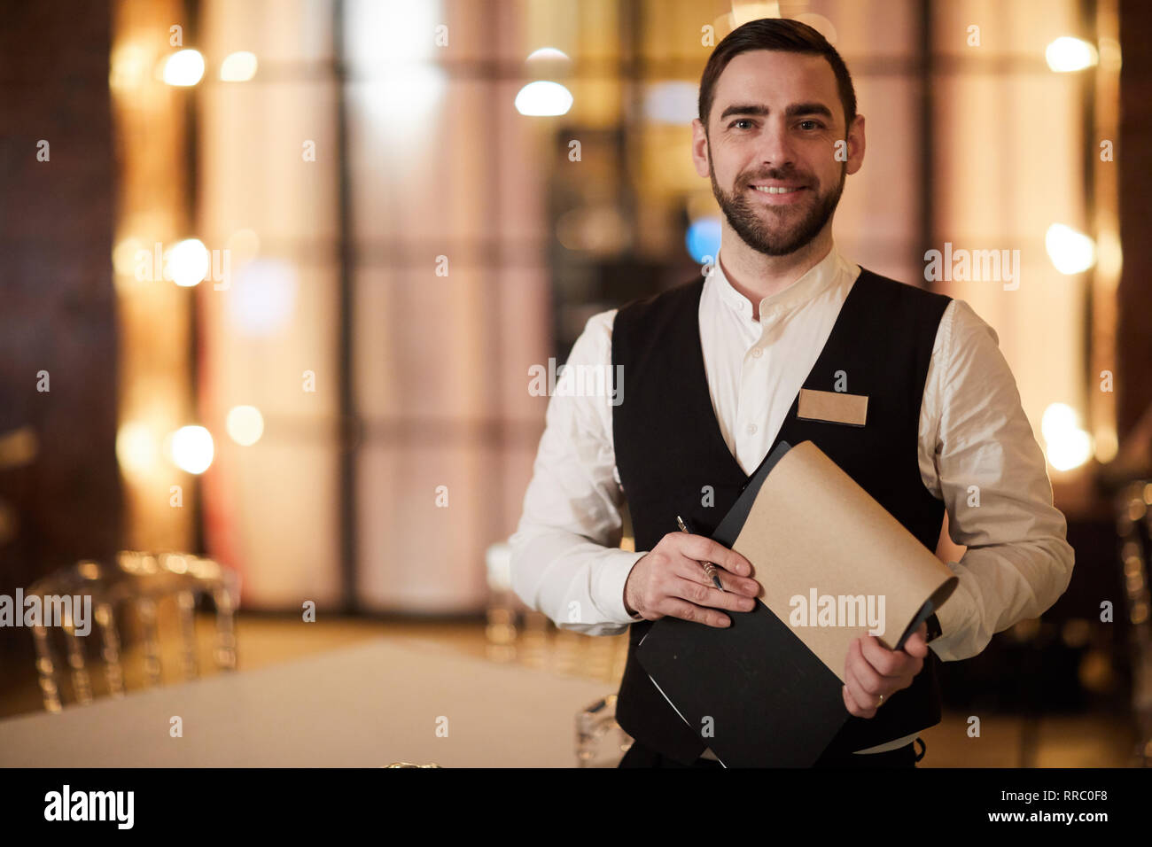 Profesional Waiter in Restaurant Stock Photo - Alamy