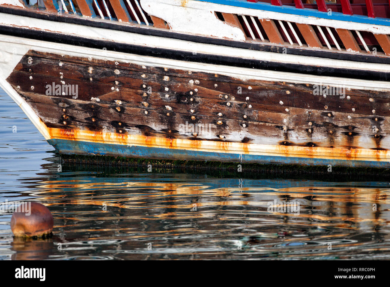 DOHA, QATAR - January 30, 2017: the brightly painted hull of a dhow in ...