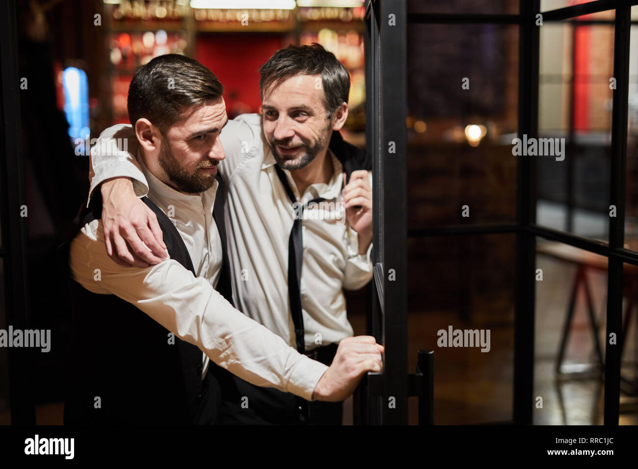 Drunk Man Leaving Pub Stock Photo - Alamy
