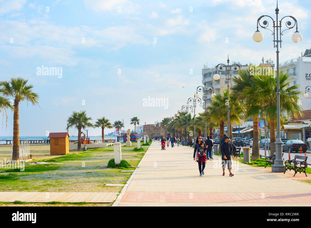 LARNACA, CYPRUS - FEBRUARY 19, 2019: People walking by Larnaca ...