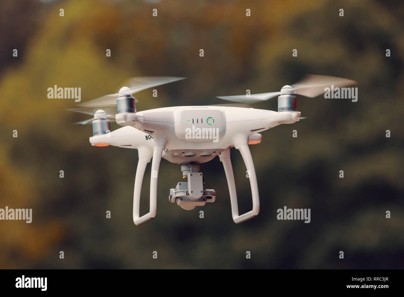 drone quad copter with high resolution digital camera against natural ...