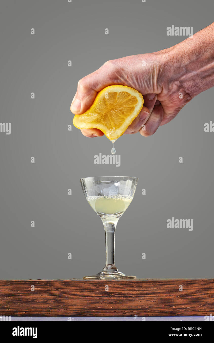 Squeezing lemon to water hi-res stock photography and images - Alamy