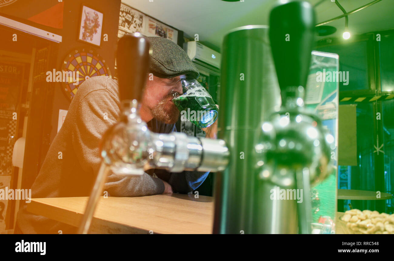 Irish man holding beer glass during the st patrick day hi-res stock ...