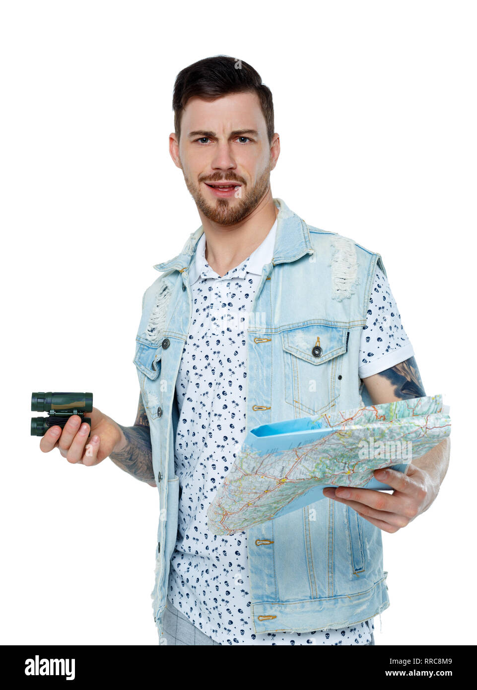 man with a map. Front view. The tourist in the denim jacket is angry or ...