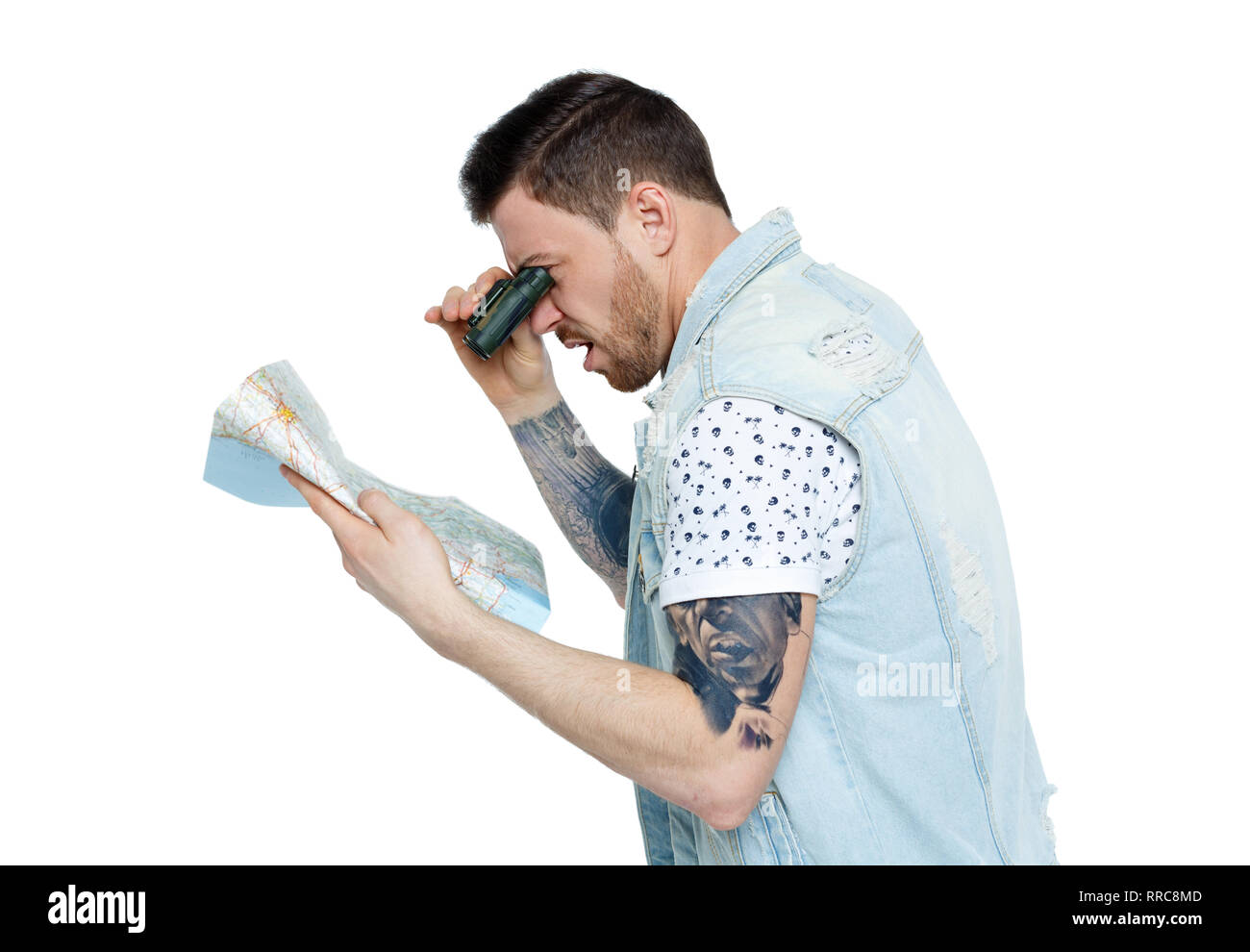 man with a map. Side view. Isolated on white background. The traveler ...
