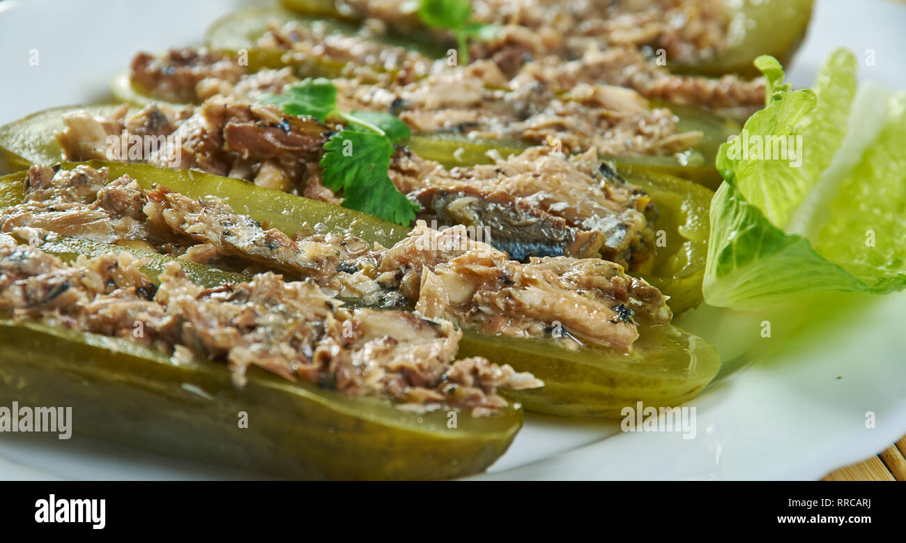 Wicked Tuna Salad Pickle Boats close up Stock Photo - Alamy
