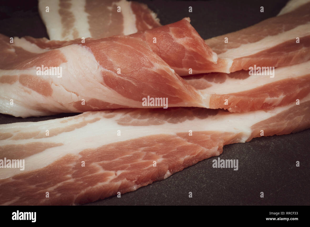 Back bacon dark background hi-res stock photography and images - Alamy