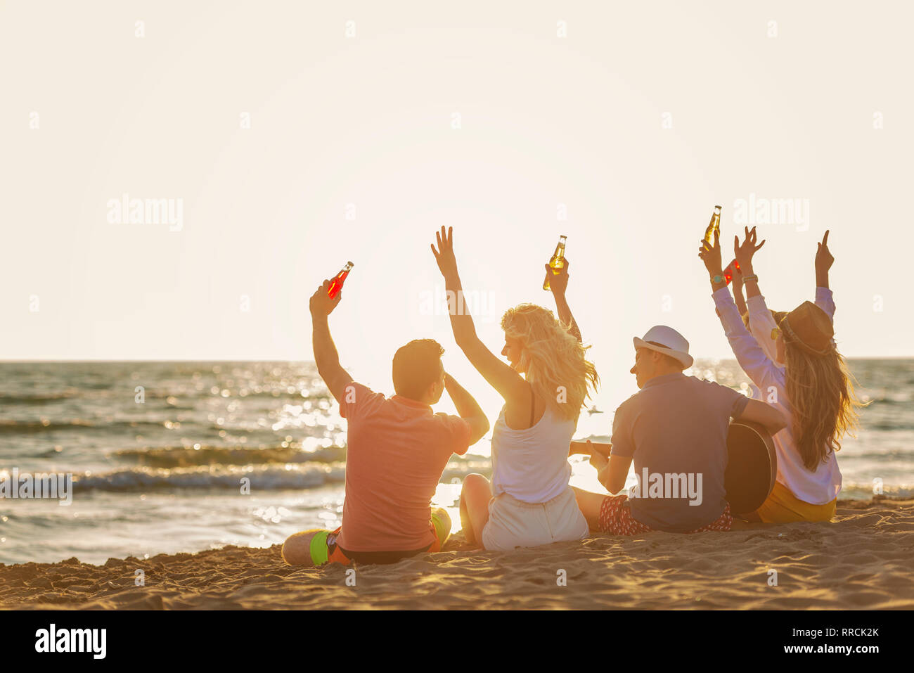 Group friends enjoy beach hi-res stock photography and images - Alamy