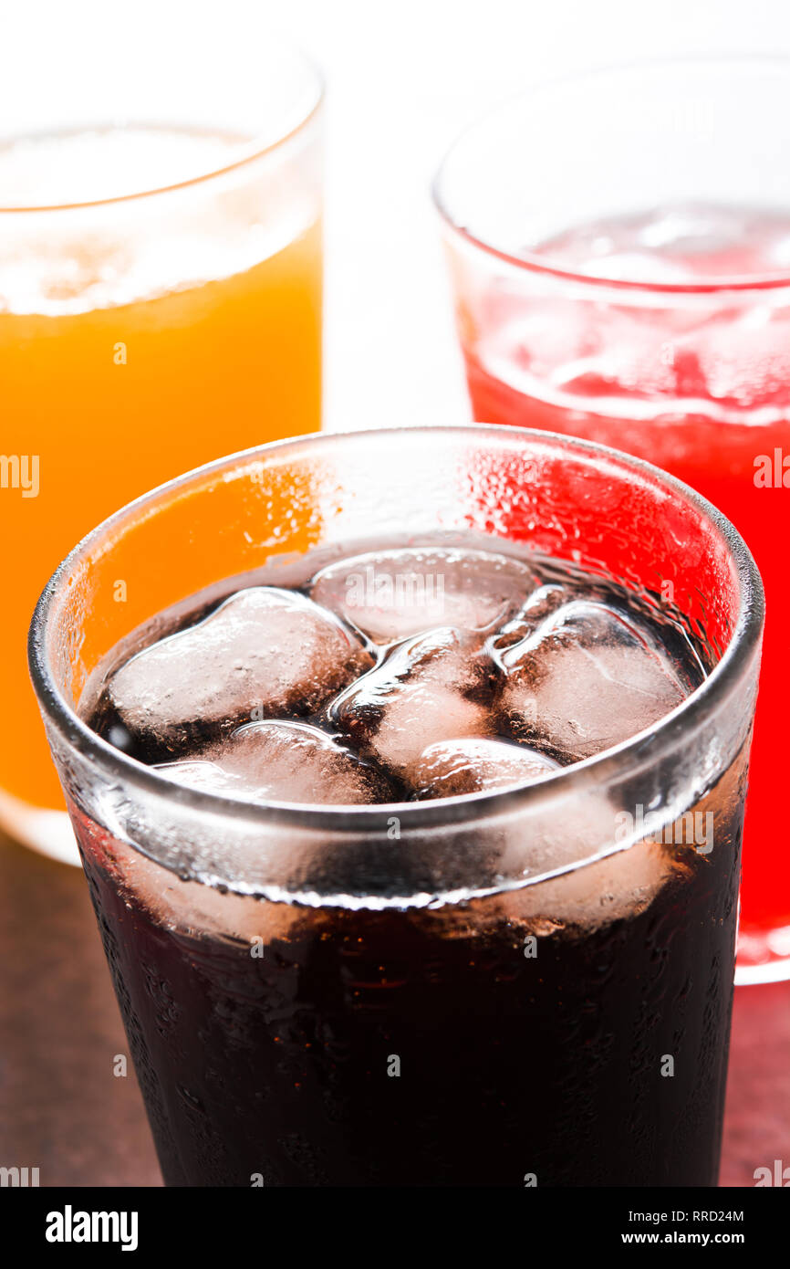 Colorful soft drinks for summer on gray background Stock Photo - Alamy