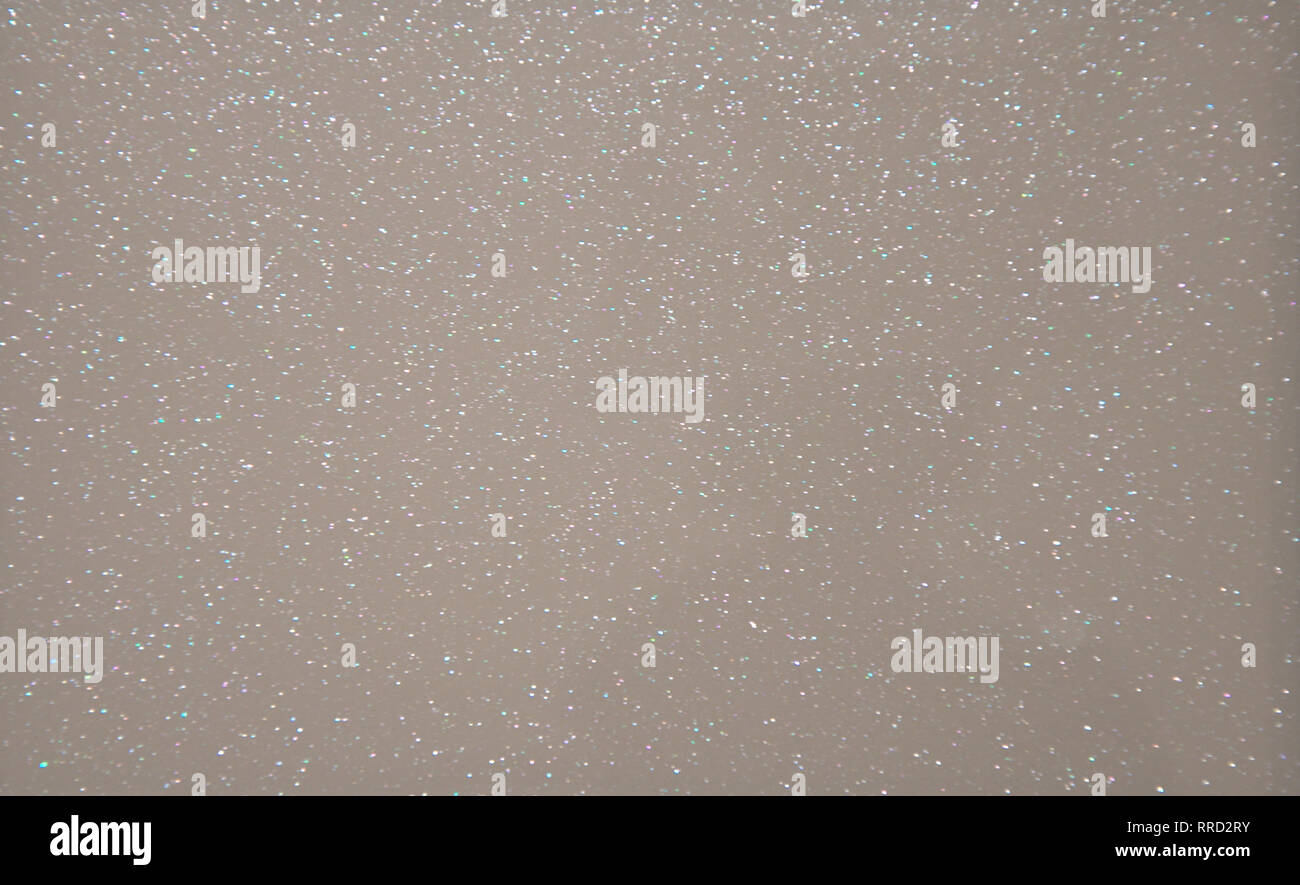 Light gray pearlescent transparent background with metal splashes ...