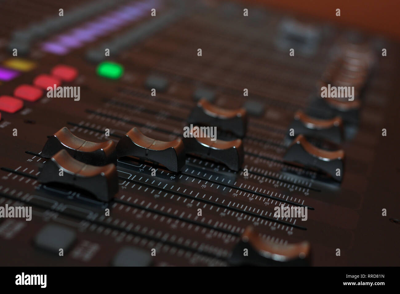 Professional concert mixing console long-stroke faders. Close-up Stock ...