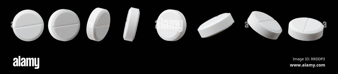 Different angles of white pill Stock Photo - Alamy