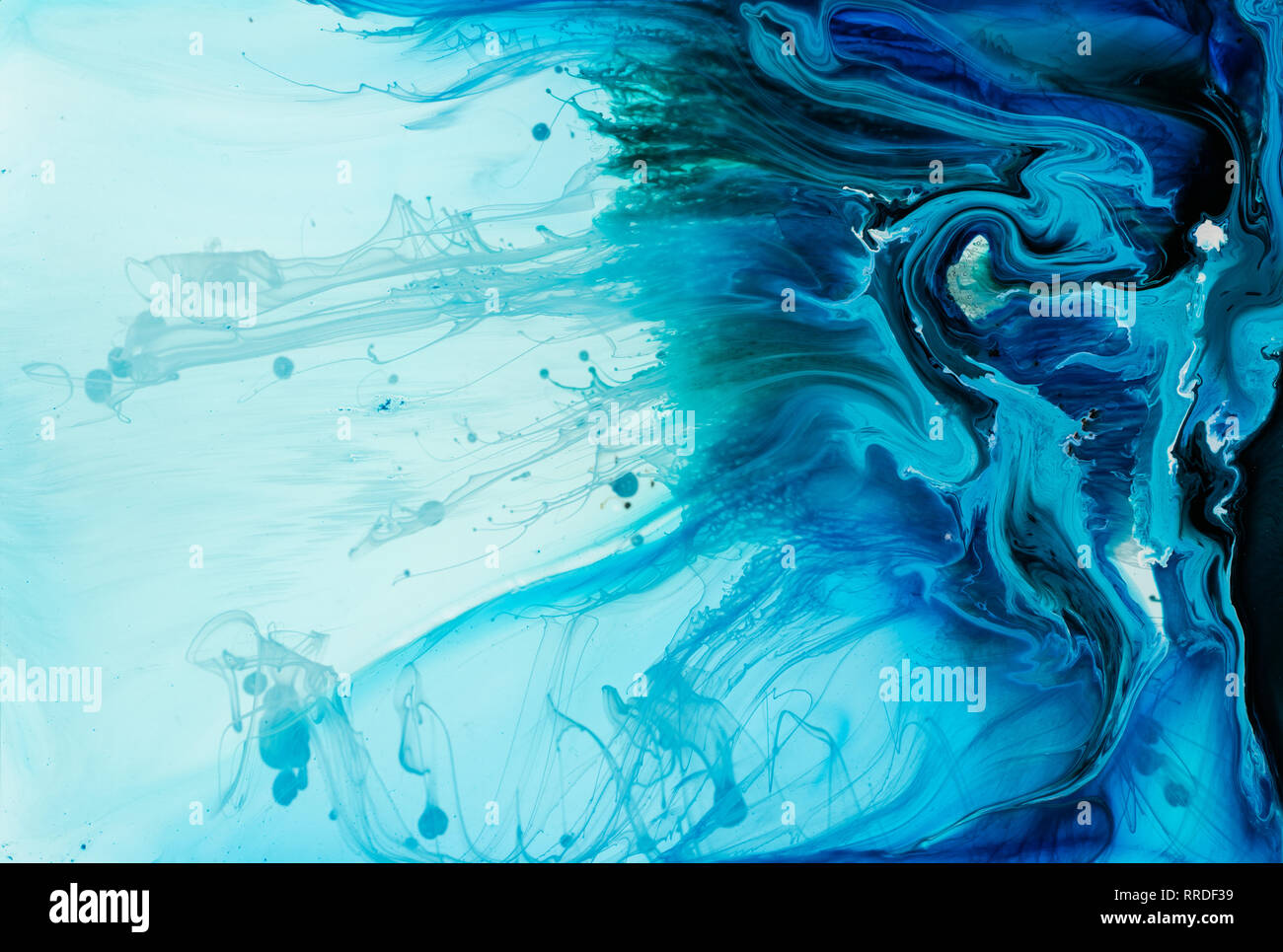 Abstract flow of liquid paints in mix Stock Photo - Alamy