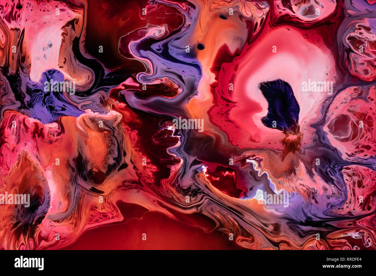 Abstract flow of liquid paints in mix Stock Photo - Alamy