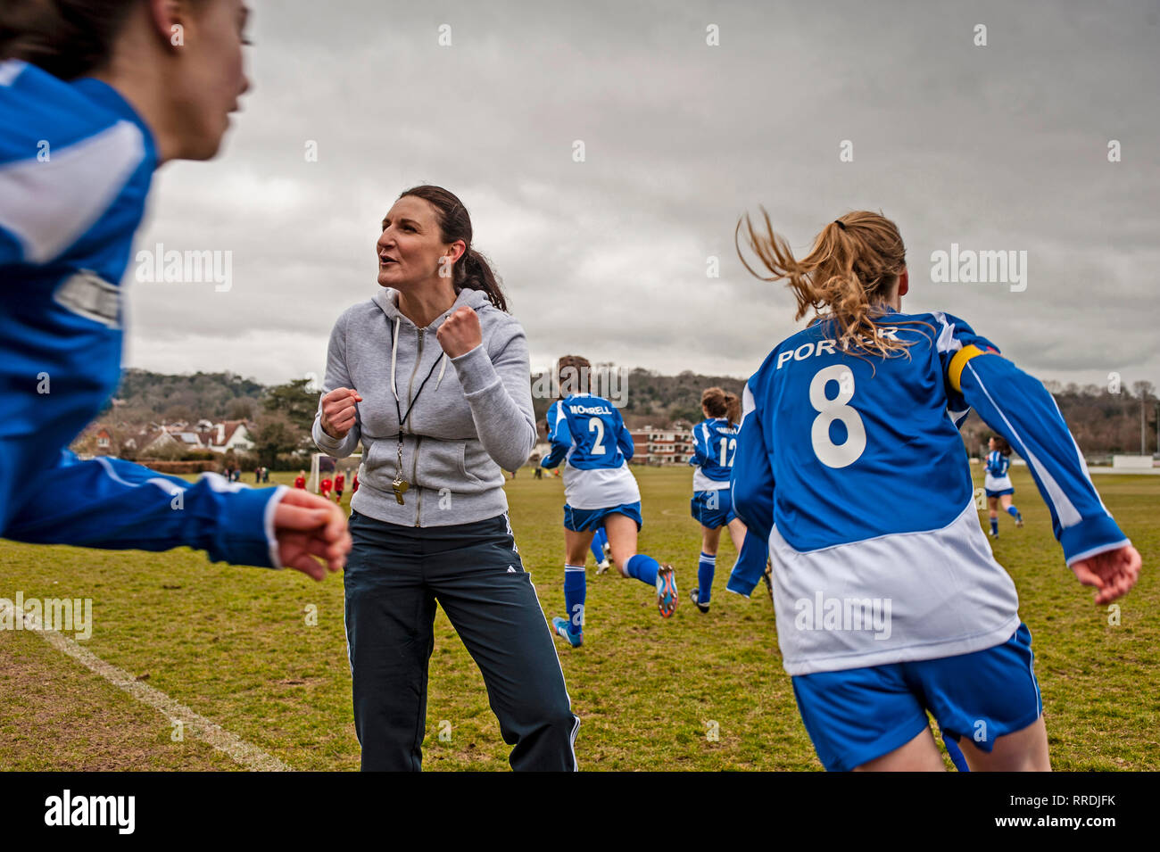 Girls football team coach hi-res stock photography and images - Alamy