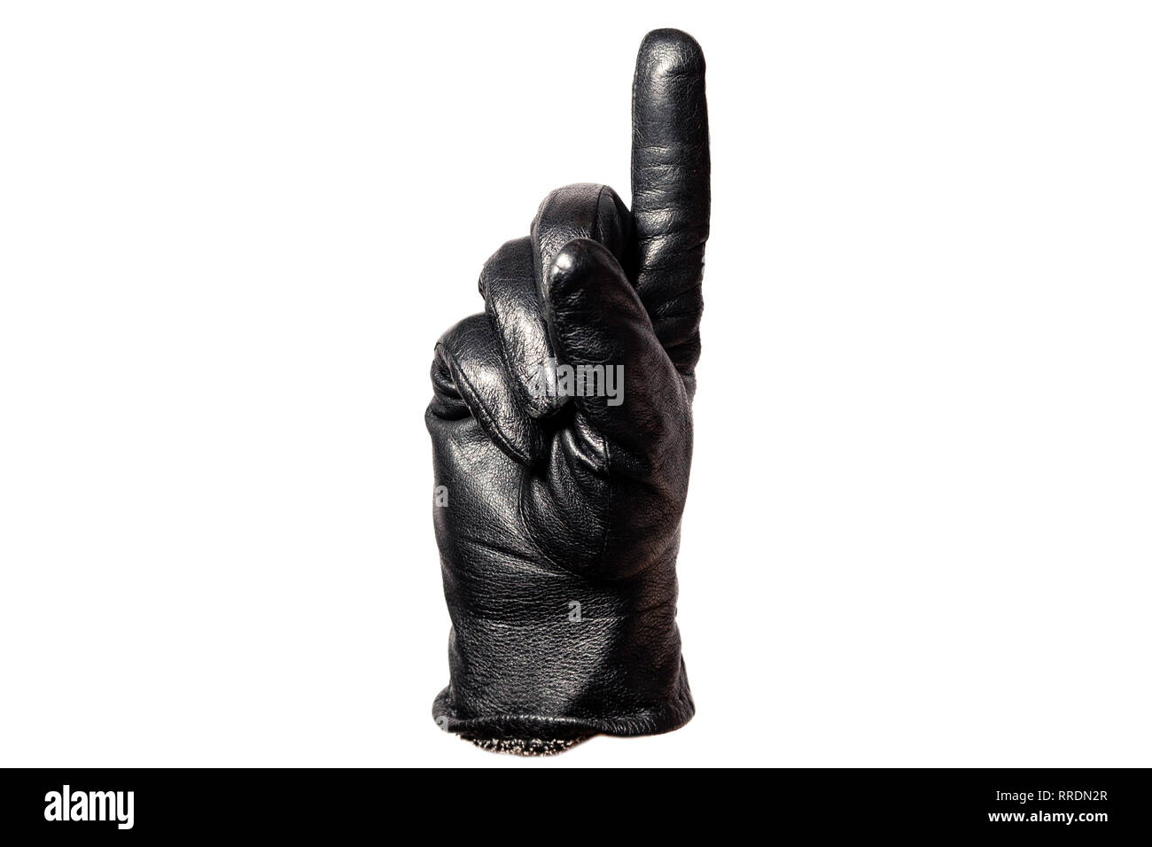 Close-up black leather glove showing thumbs up, number one. Isolated on ...