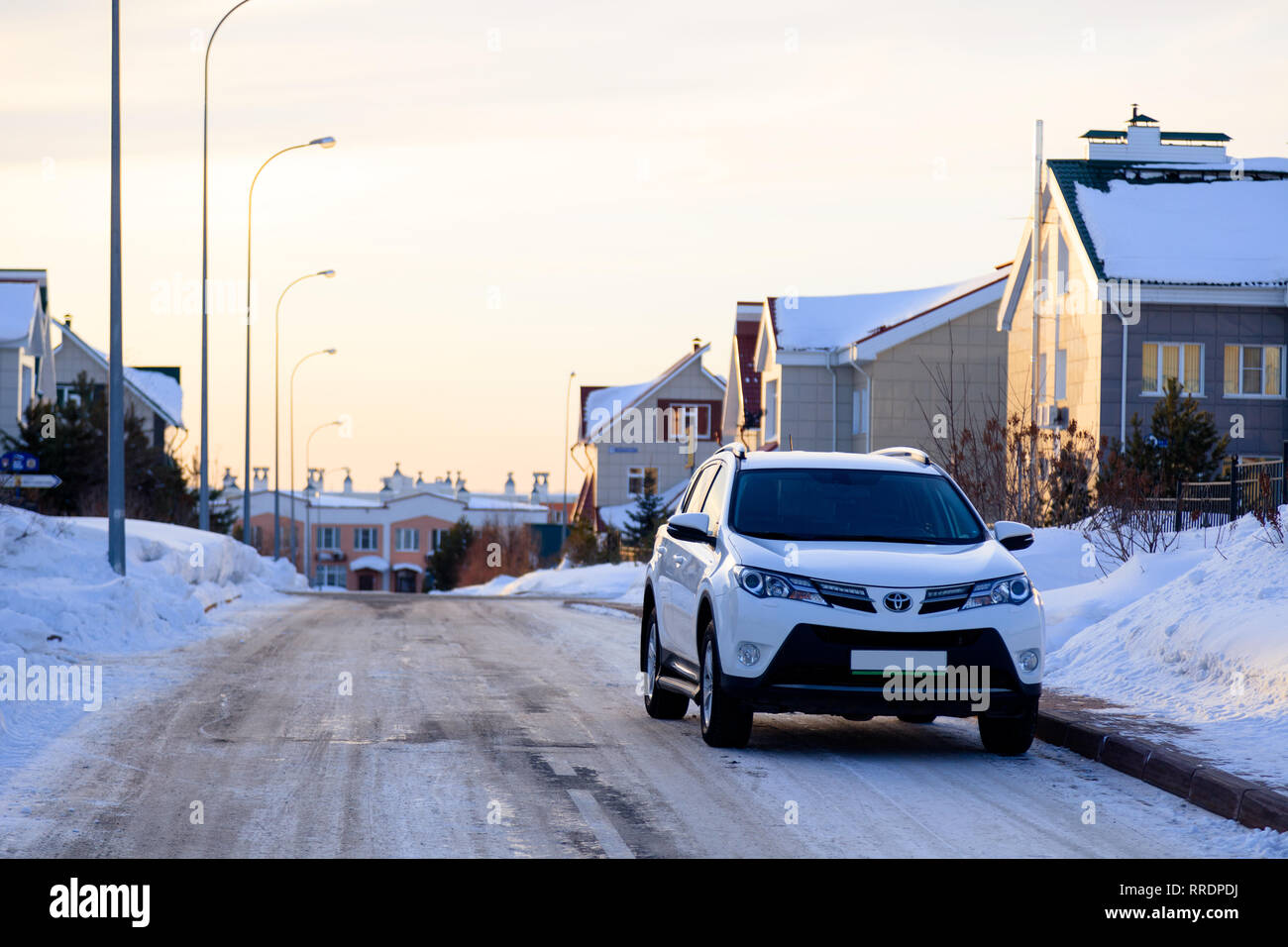 Russia, Kemerovo 2019-02-24 white SUV Toyota Rav 4 in a new body parked ...