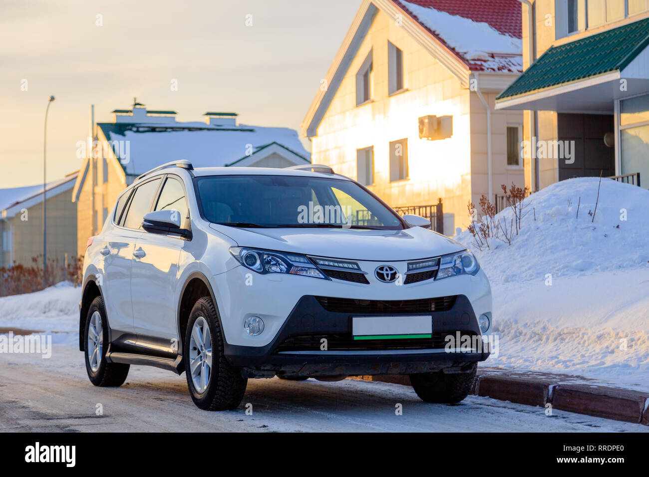 Russia, Kemerovo 2019-02-24 white SUV Toyota Rav 4 in a new body parked ...