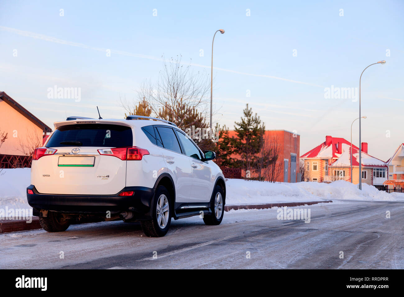 Russia, Kemerovo 2019-02-24 white SUV Toyota Rav 4 in a new body parked ...