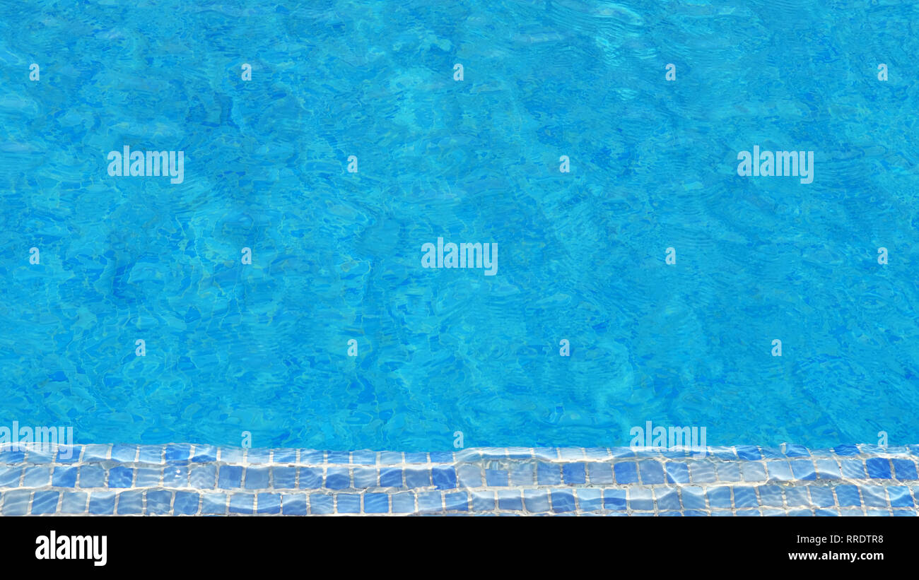 Swimming pool water background with mosaic tiles at one end, texture of ...