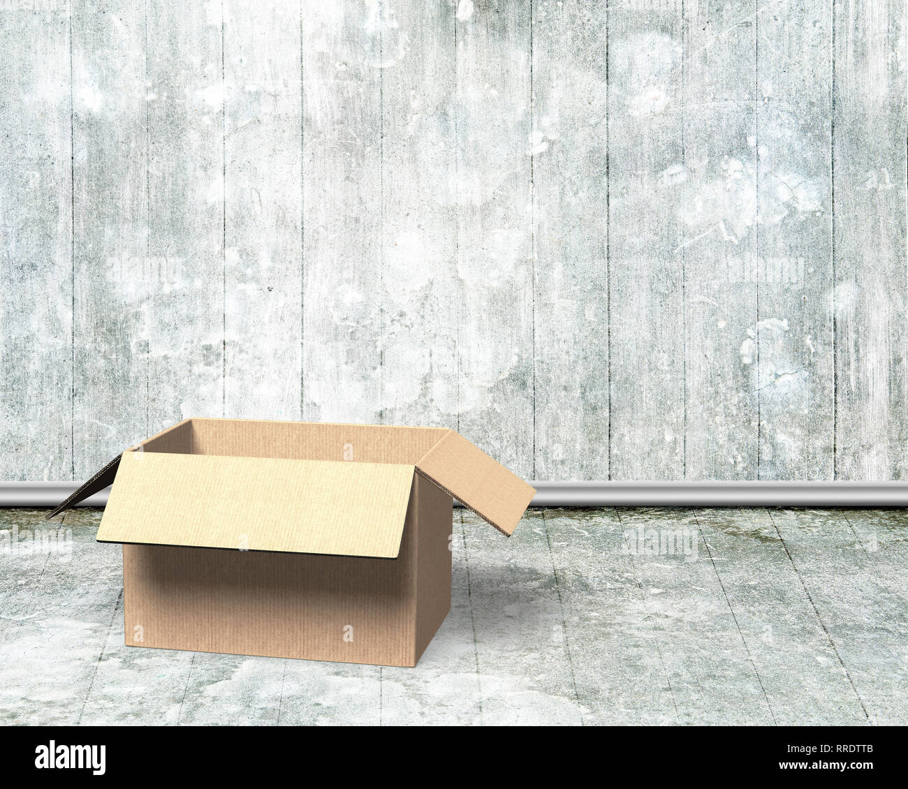 Opened cardboard box, on dirty wooden wall and floor indoors background ...