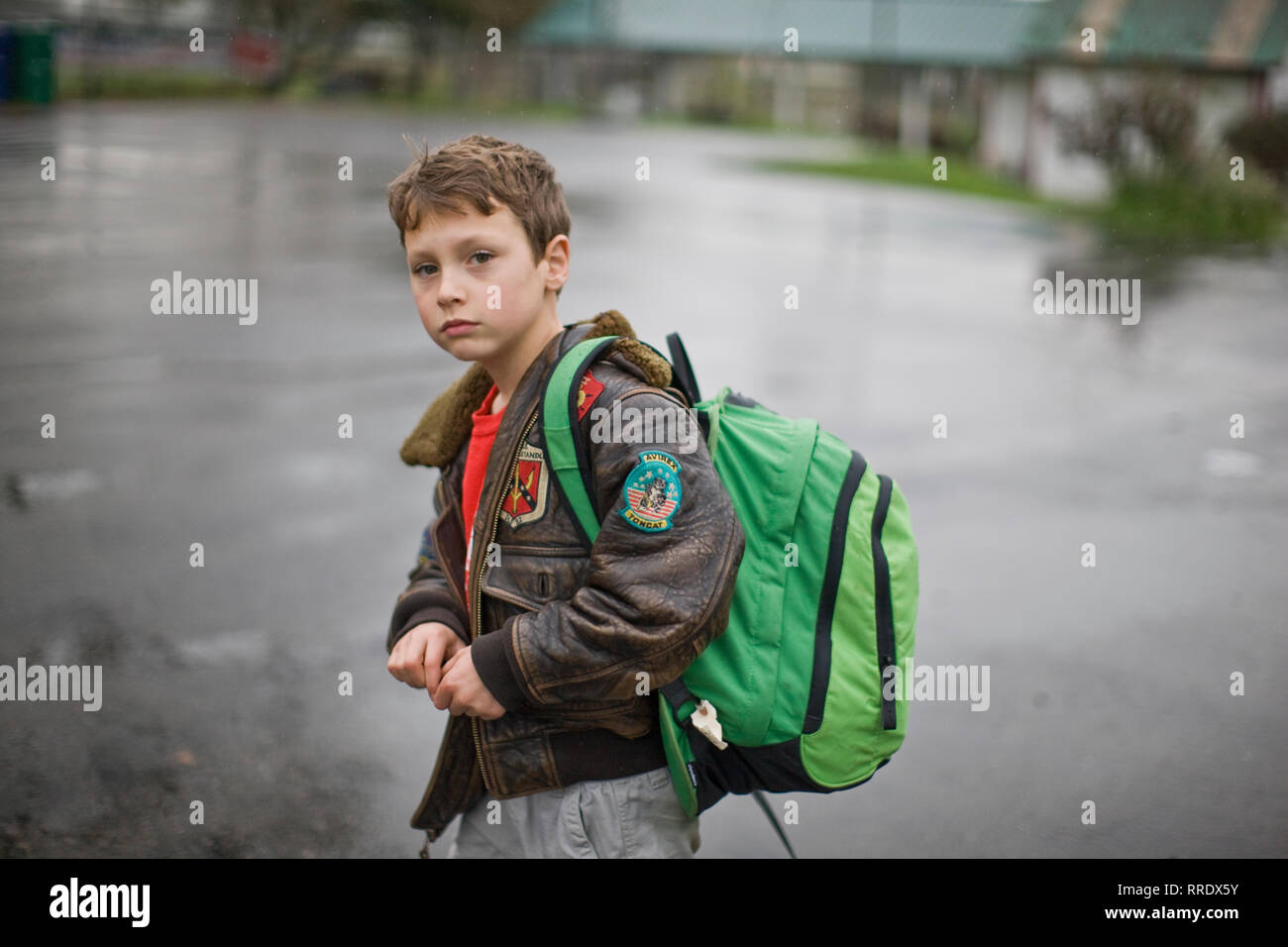 Boy wearing backpack Stock Photo - Alamy