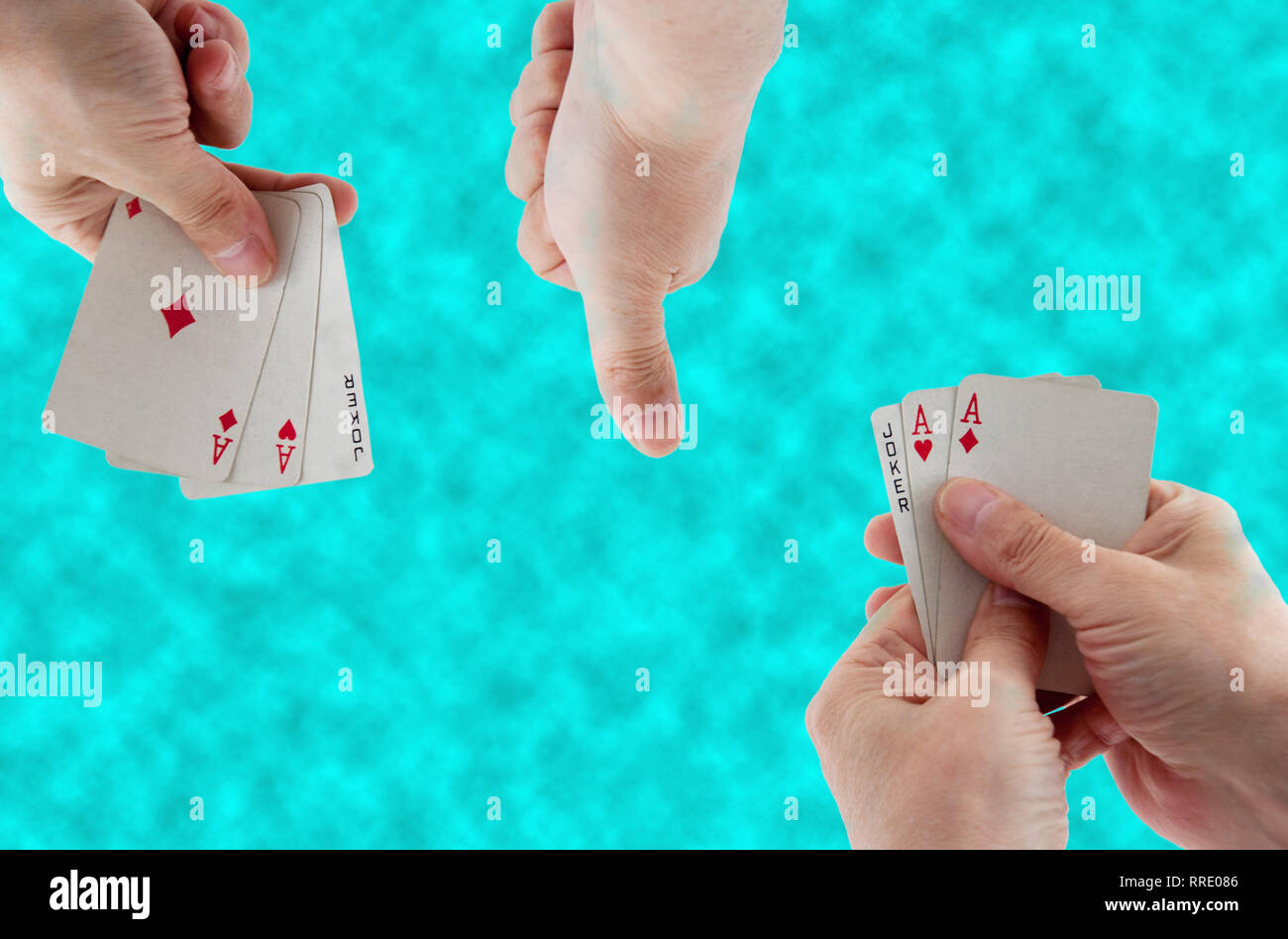 playing cards in hand on the background of the water in the pool Stock ...
