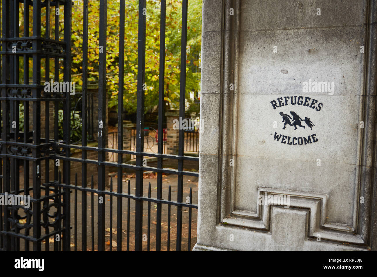 Park architecture of decorative column and railings with sunlit ...