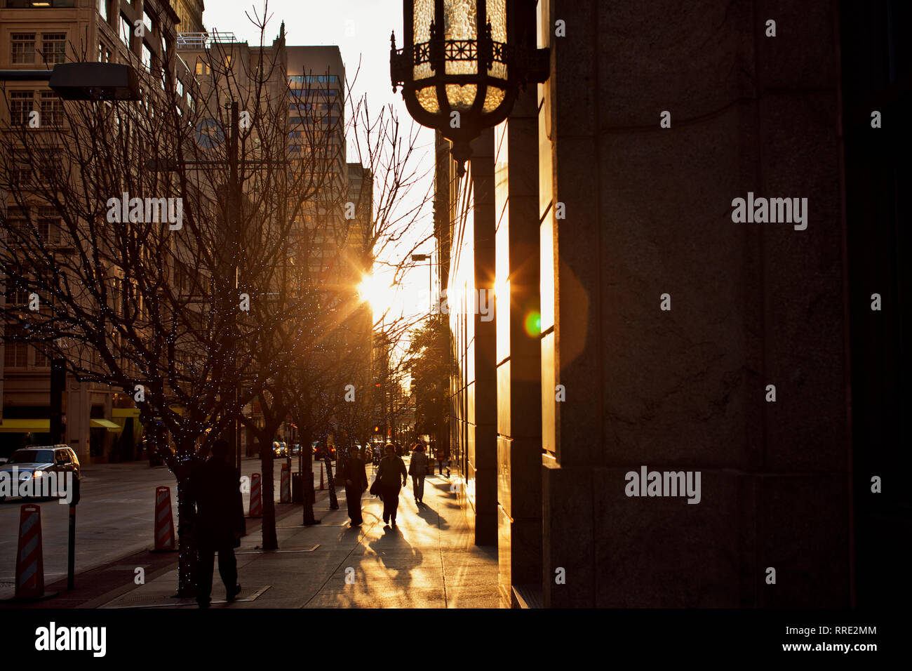Urban street at sunset Stock Photo - Alamy