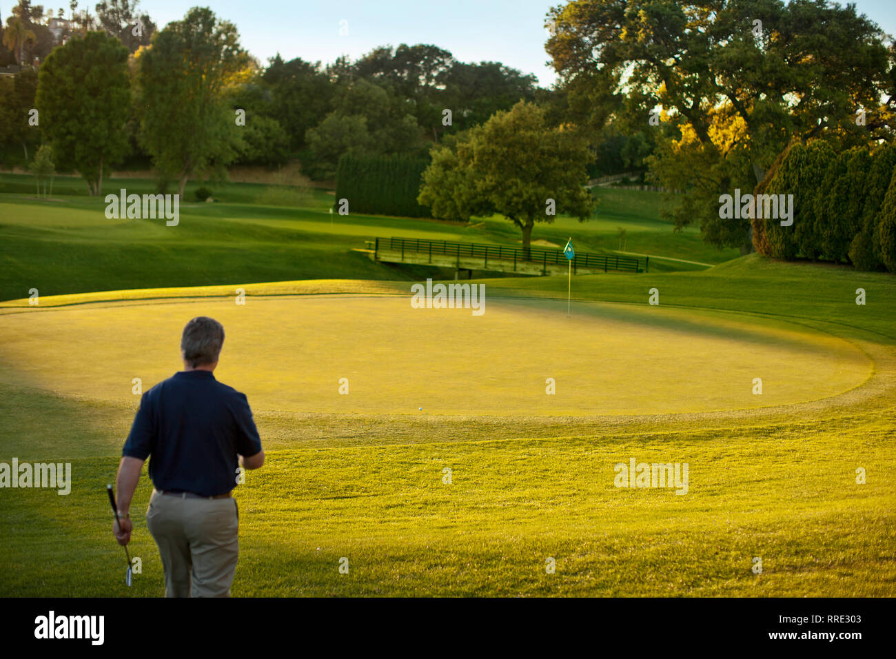 Man walk on a bridge back view hi-res stock photography and images - Alamy