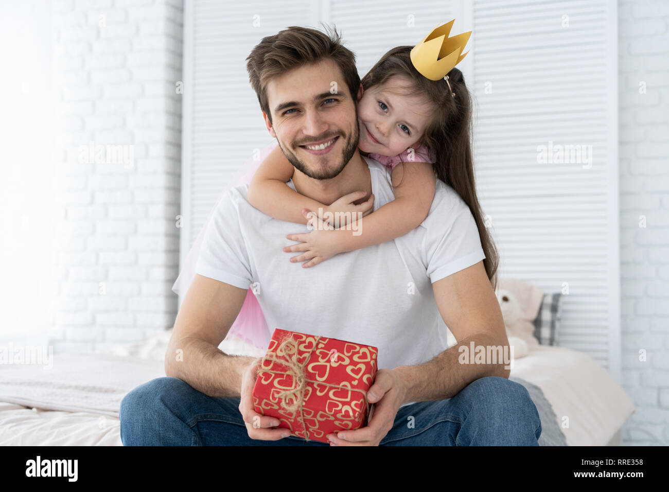 Father's day. Happy family daughter hugging dad and laughs on holiday ...