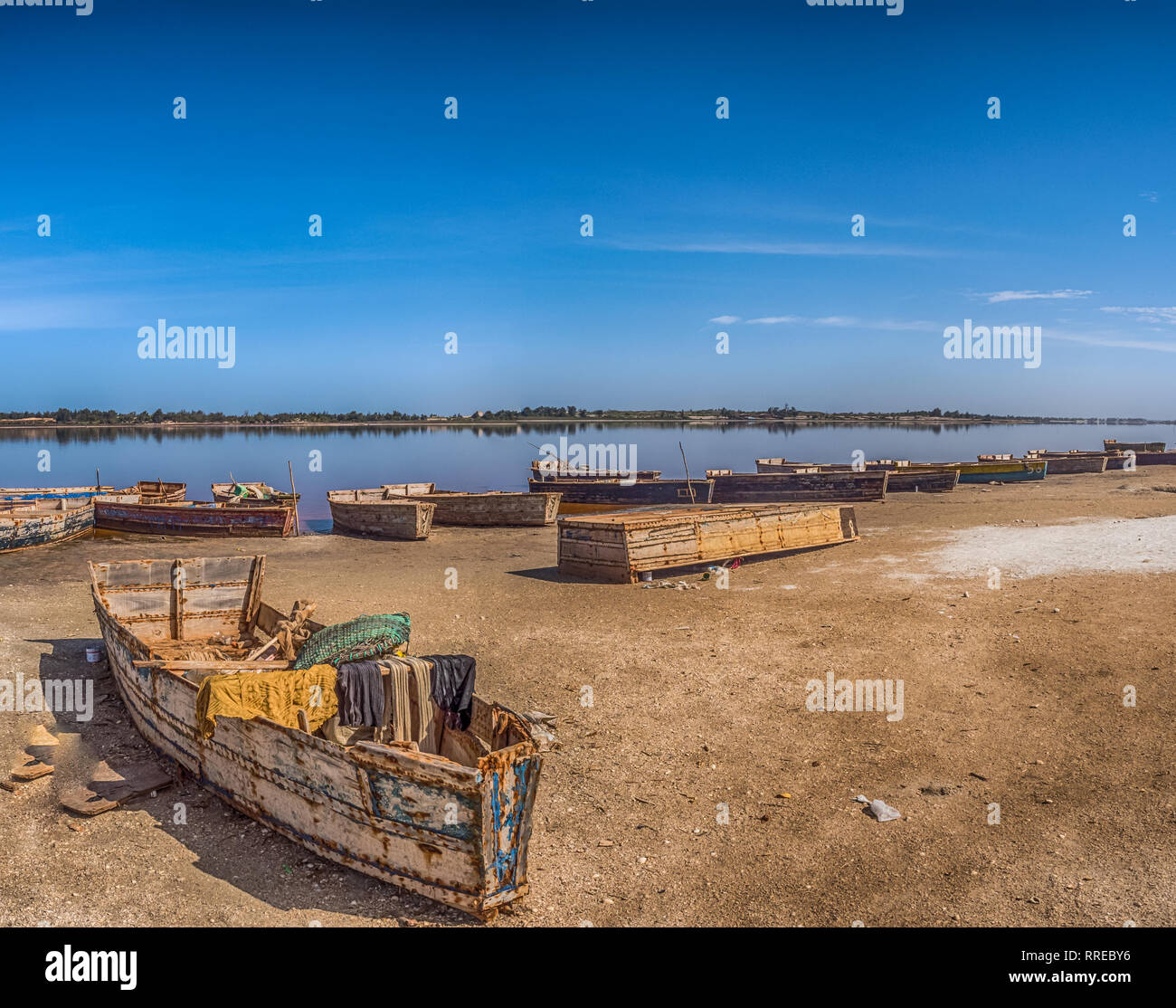 Lac Rose, SenegalL - Feb 02, 2019: Wooden boats on the coast of the ...