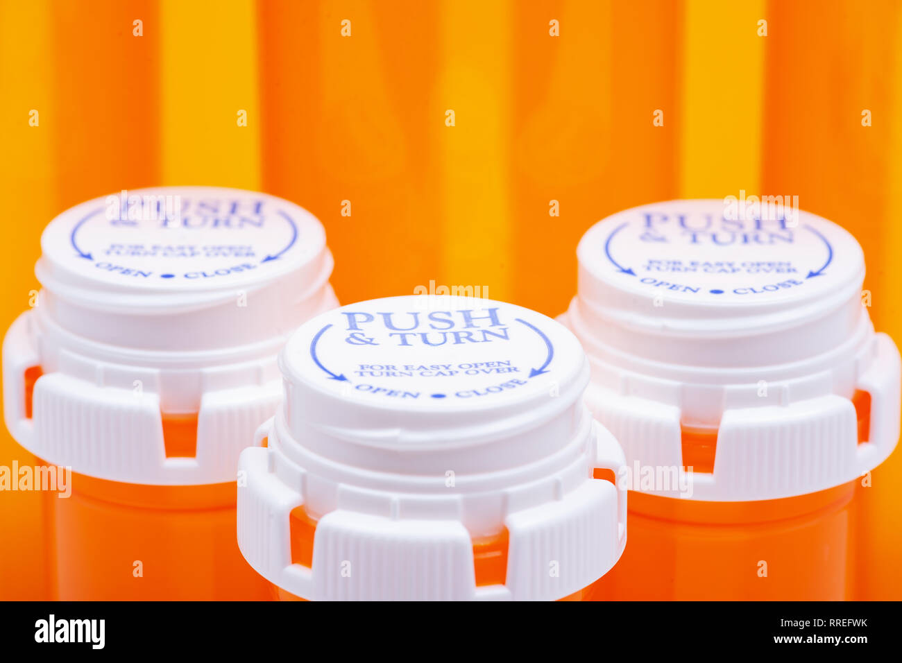 Orange plastic empty prescription containers with Child-Resistant Push ...
