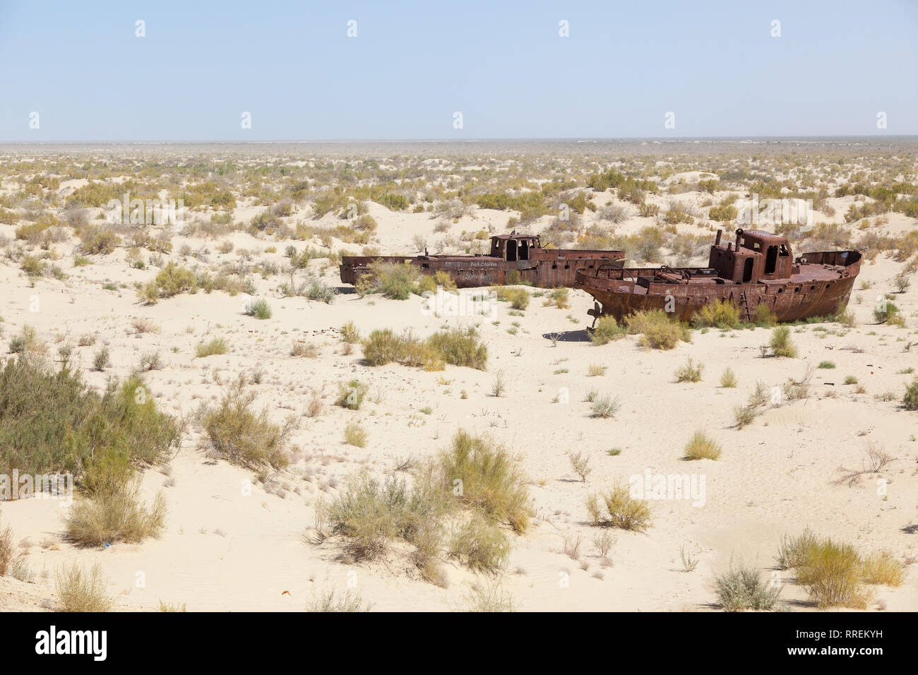Rustic boats on a ship graveyards on a desert around Moynaq, Moynoq or ...