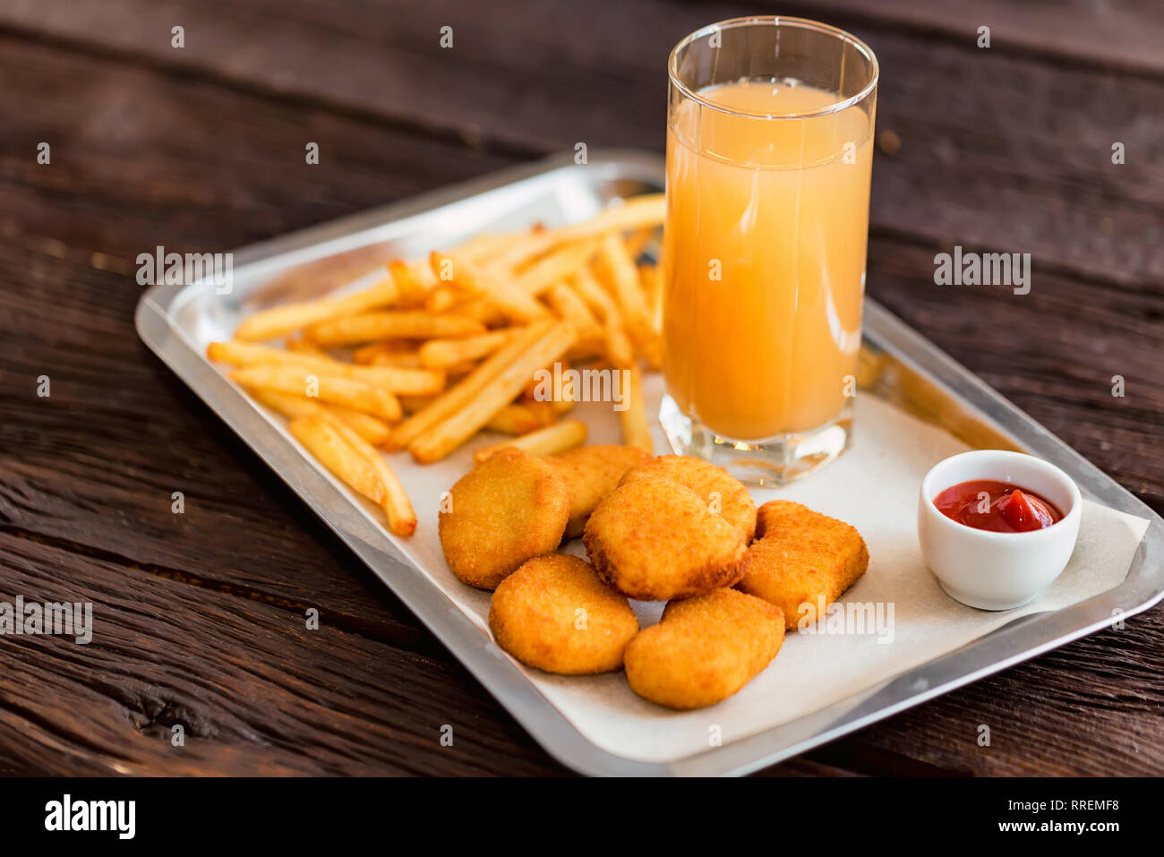 French fries and orange juice hi-res stock photography and images - Alamy