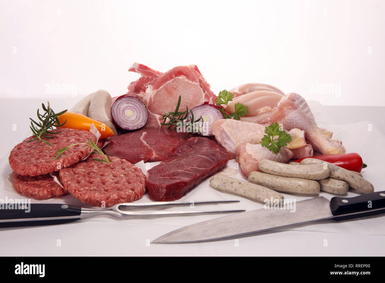 raw meat. Different types of raw pork meat, chicken and beef with ...