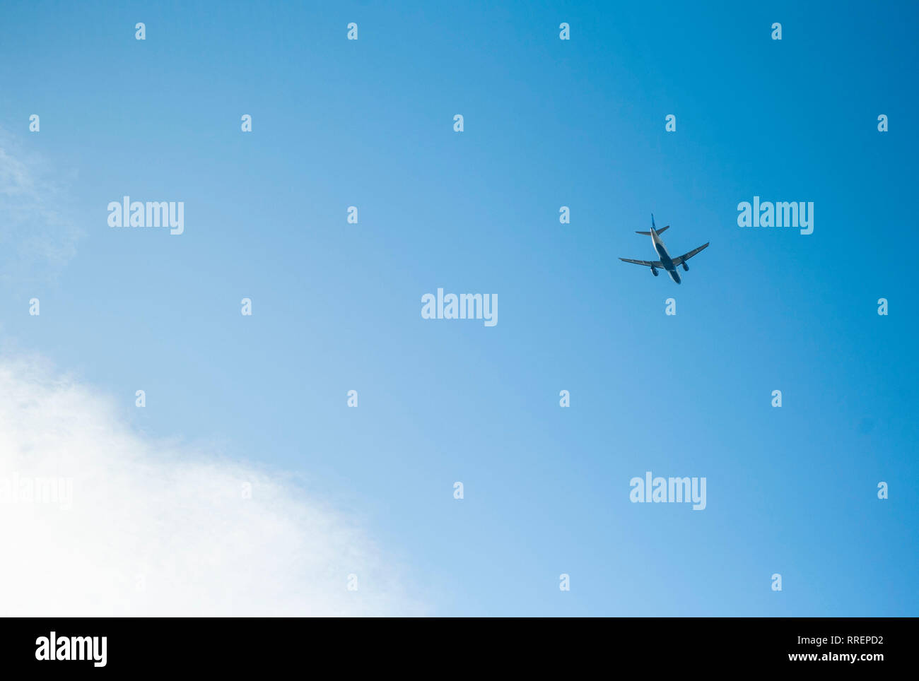 Passenger aircraft in flight Stock Photo - Alamy