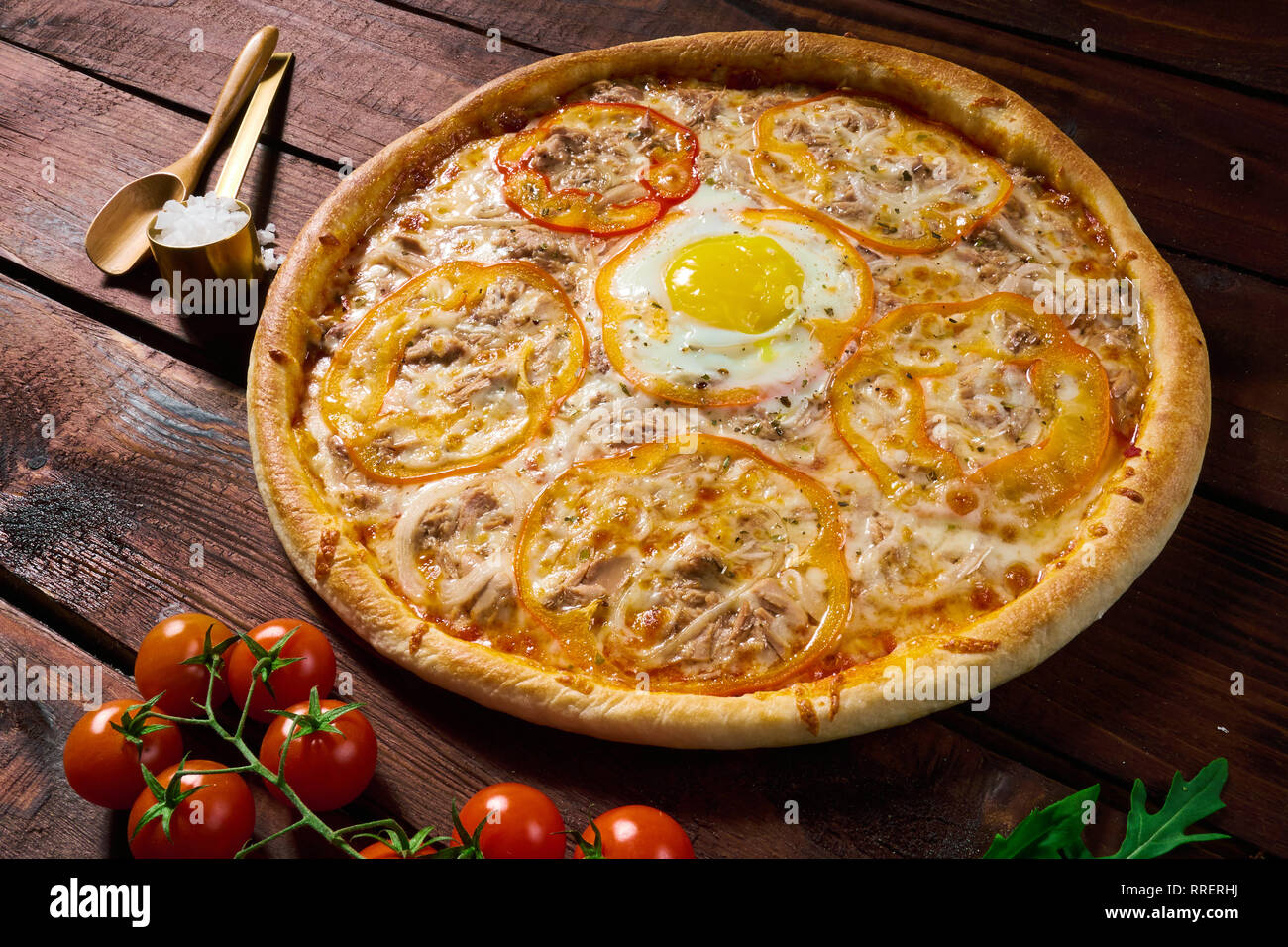 delicious Italian pizza with egg top view close-up Stock Photo - Alamy
