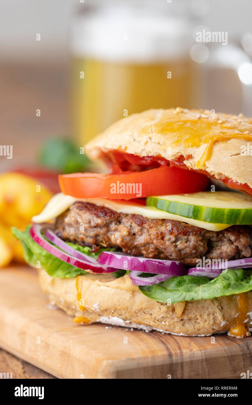 Home made burger on dark wood hi-res stock photography and images - Alamy