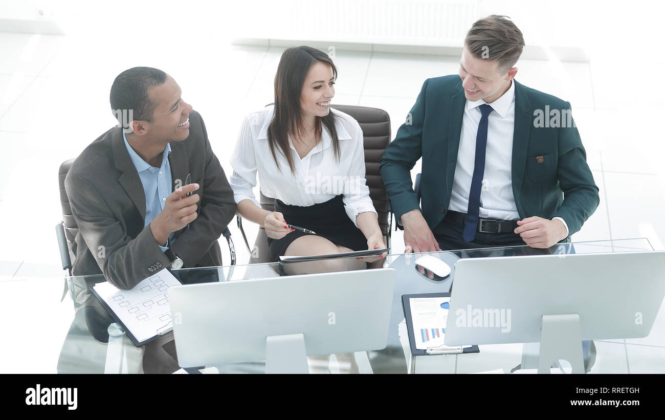 professional business team sitting at Desk in the office Stock Photo ...