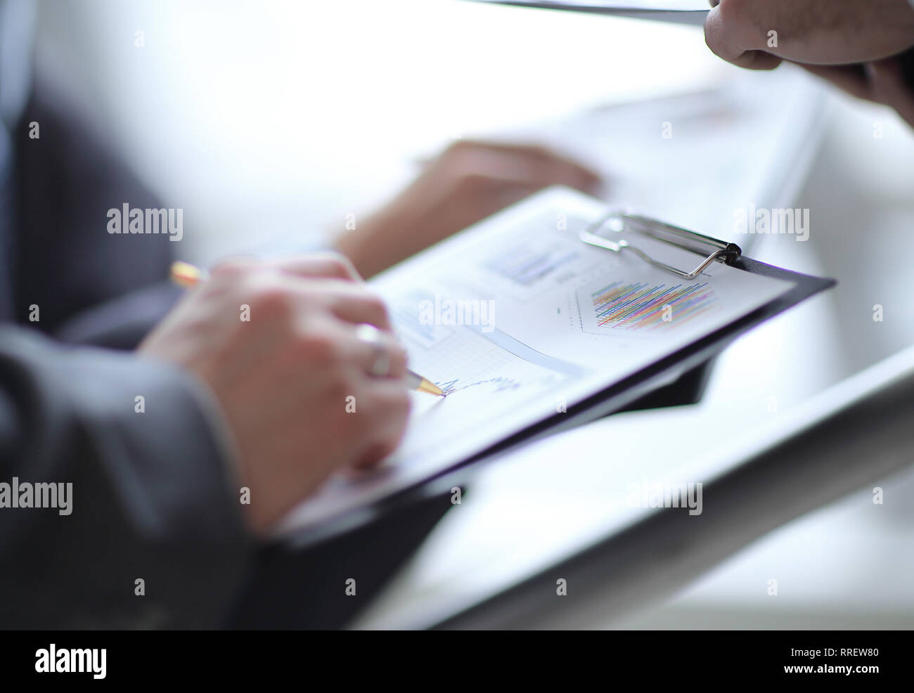 close up. business team analyzing financial schedules Stock Photo - Alamy