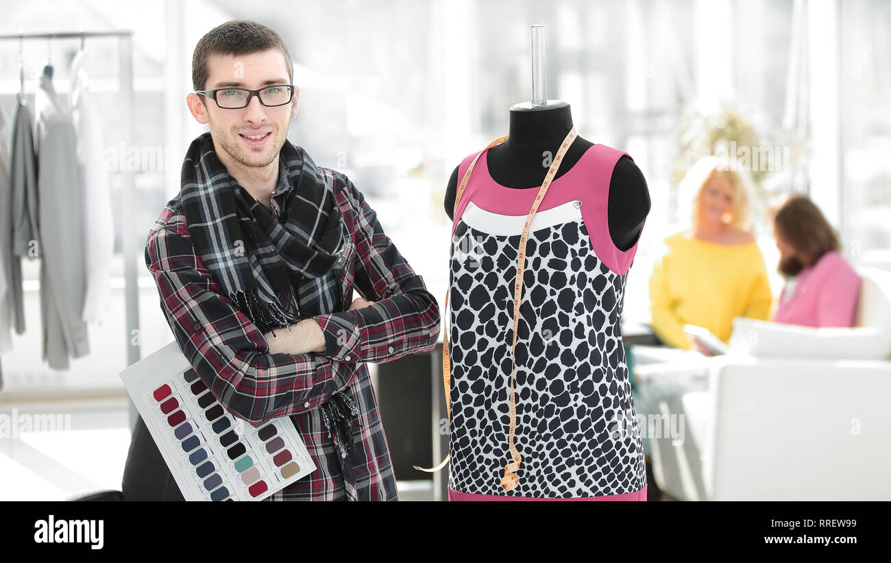 creative fashion designer standing in his Studio Stock Photo - Alamy