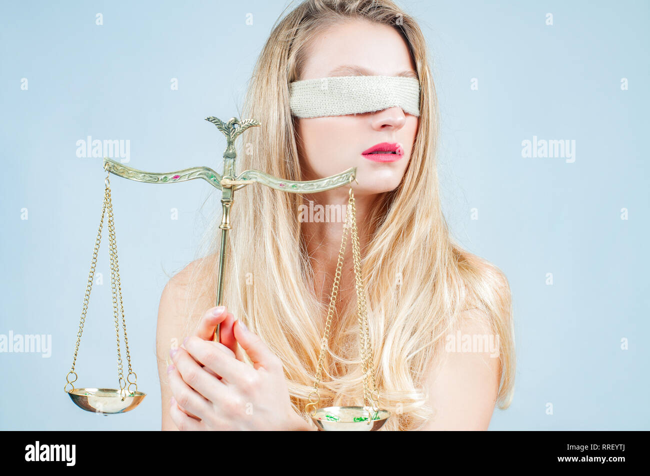 Femida, Goddess of Justice with scales wearing blindfold Stock Photo ...