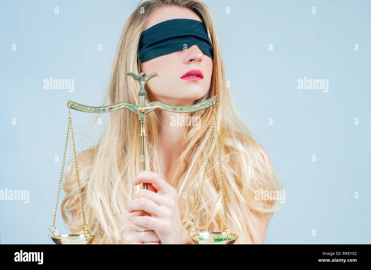 Femida, Goddess of Justice with scales wearing blindfold Stock Photo ...