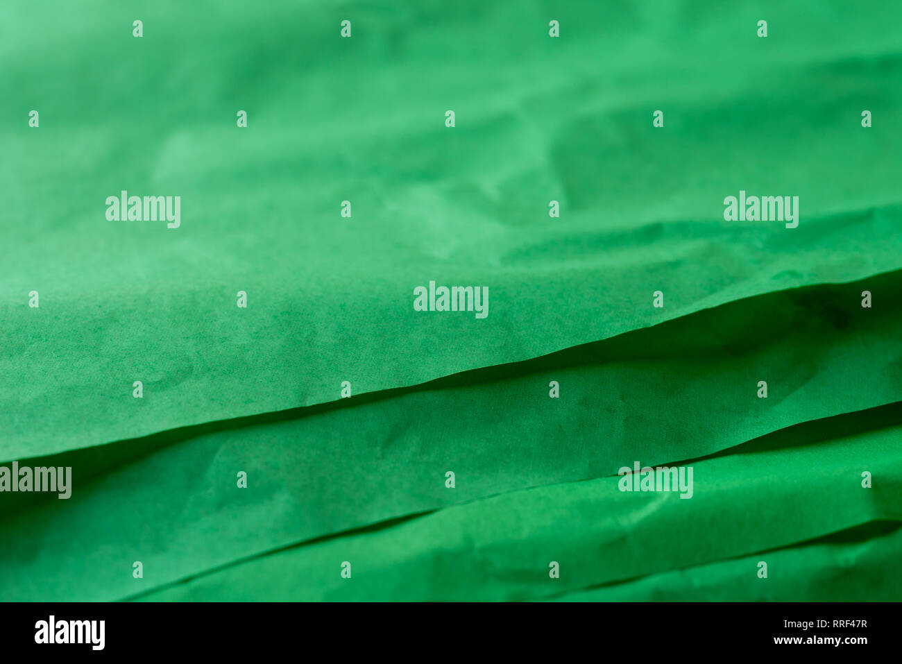 green color creased paper tissue background texture Stock Photo - Alamy