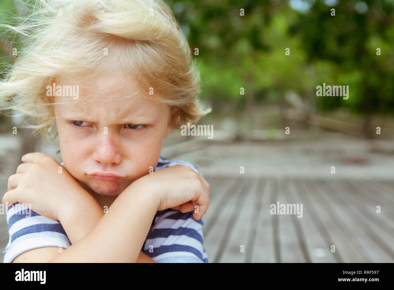 Grumpy child parents hi-res stock photography and images - Alamy