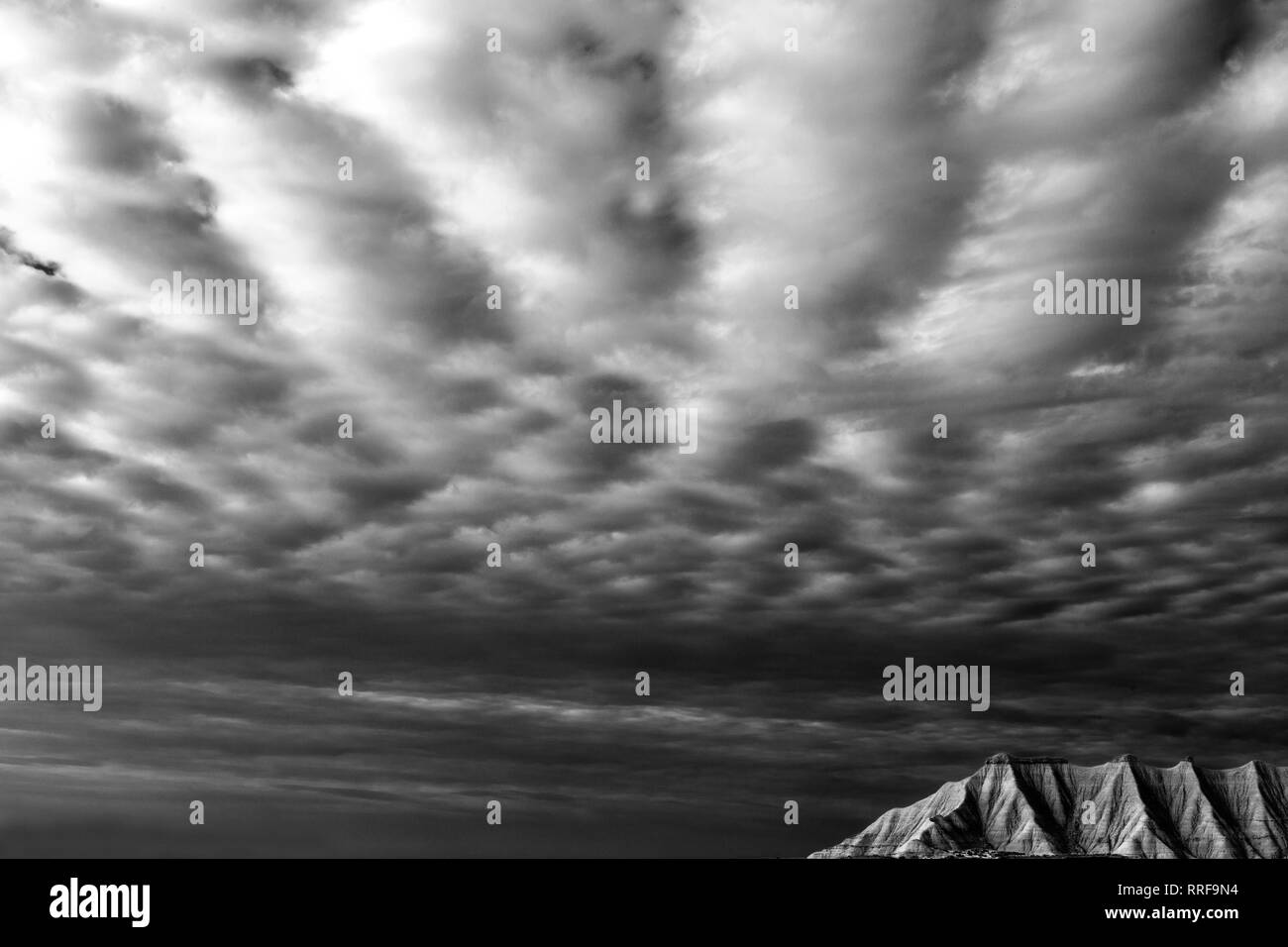 From below peak of stone mountain and amazing azure heaven with clouds ...