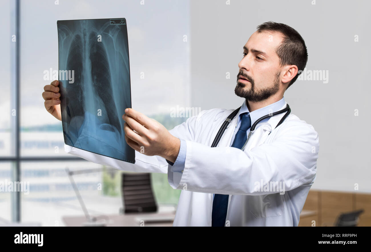 Handsome doctor portrait hi-res stock photography and images - Alamy